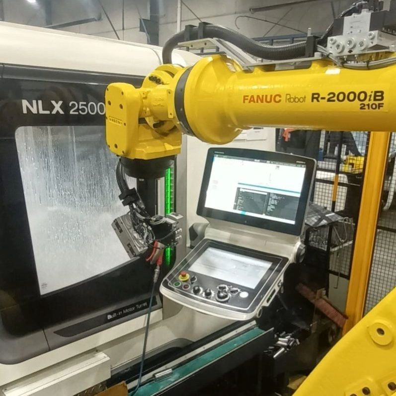 Why Use Robots For CNC Machine Tending?